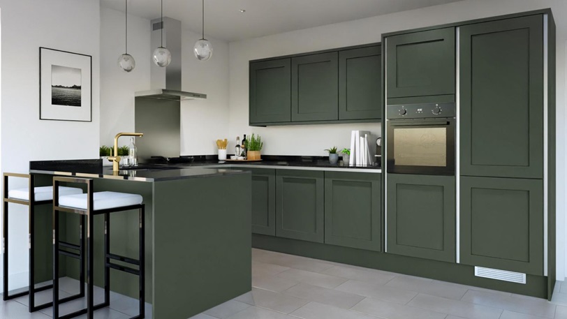 Chelford Fir Green Handleless Kitchen | Fitted Kitchens | Howdens